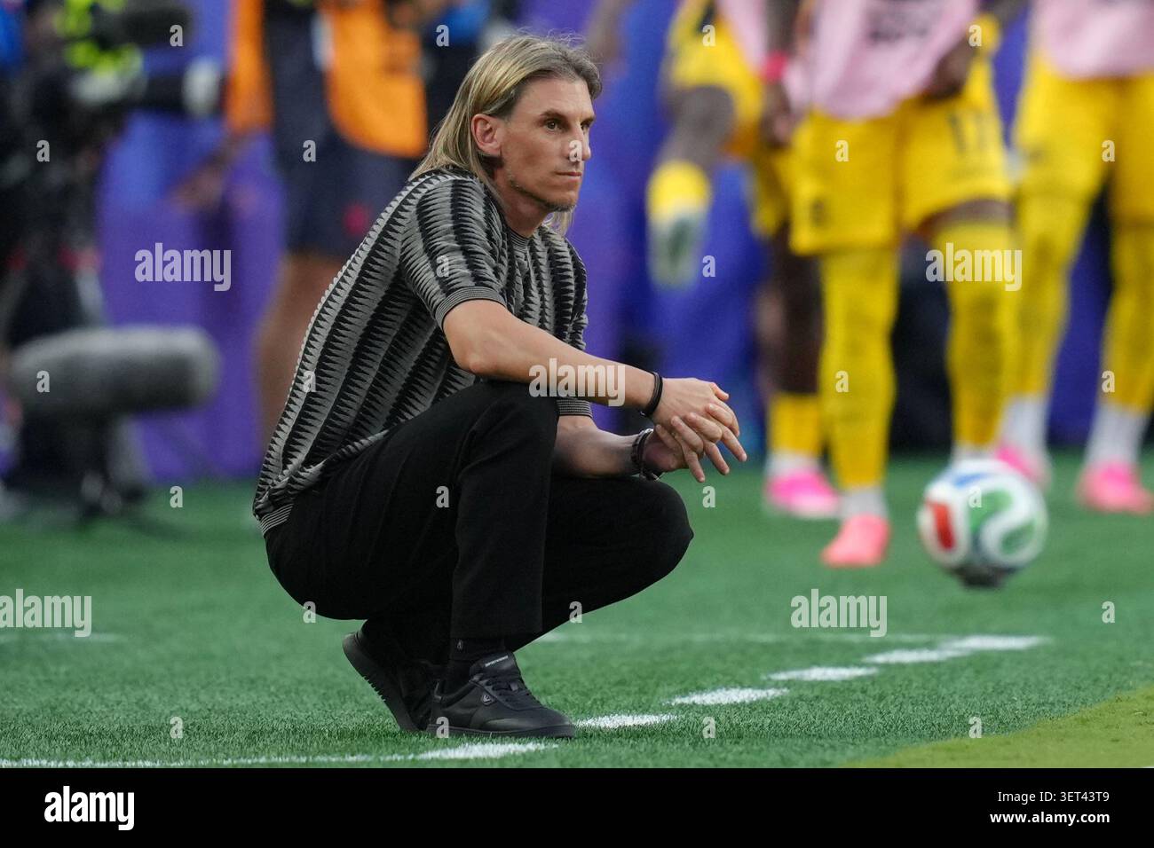 Ecuador head coach Sebastian Beccacece watches his team playing against ...