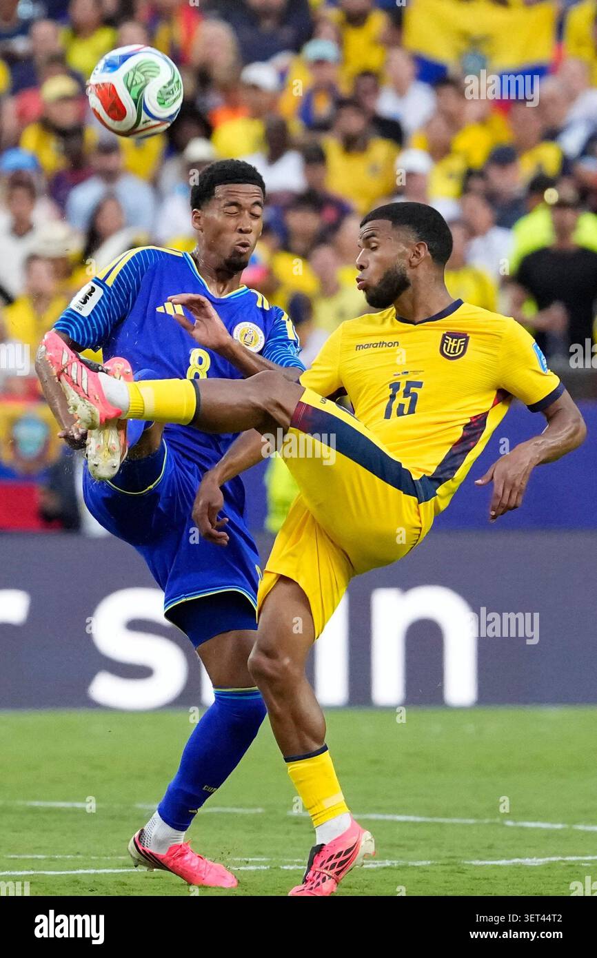 Ecuador's Pedro Vite, right, and =Curaçao's Livano Comenencia battle ...