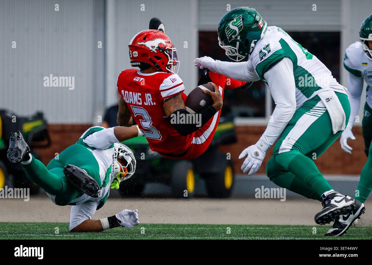 Saskatchewan Roughriders' Antoine Brooks, left, and Malcolm Bell, right ...
