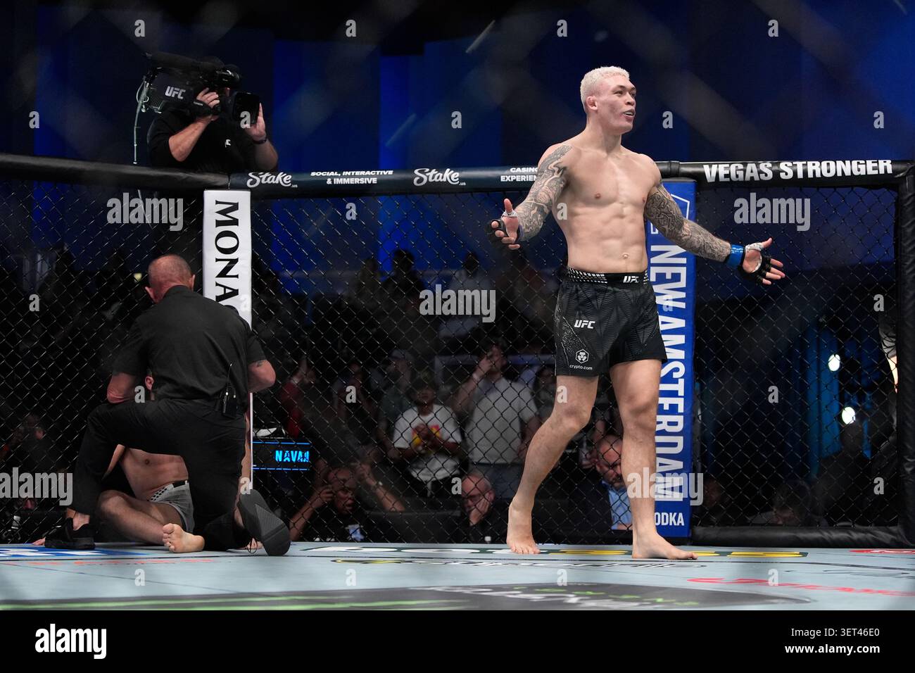 Navajo Stirling celebrates after defeating Ion Cutelaba in their light ...