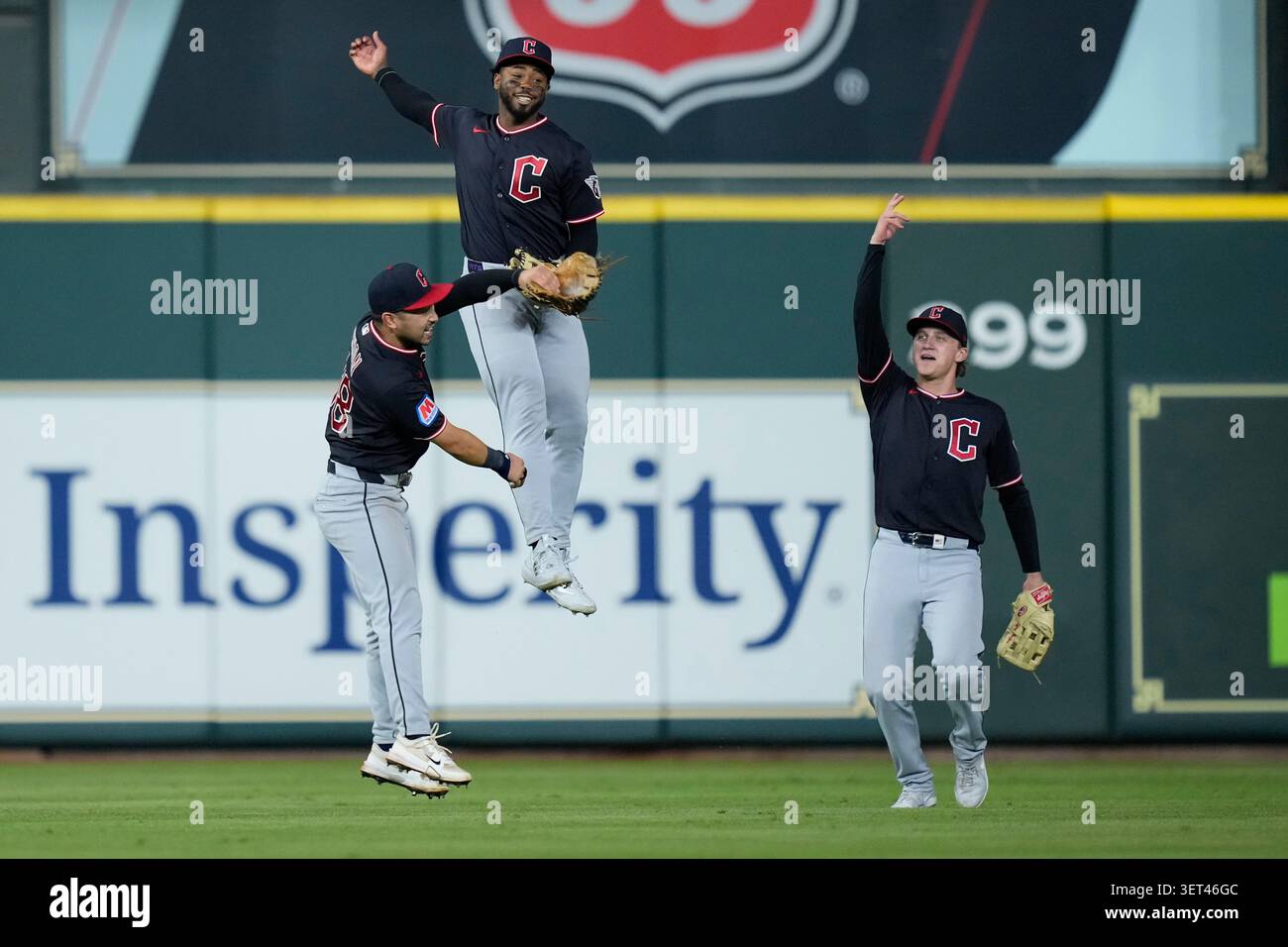Cleveland Guardians left fielder Steven Kwan, right fielder Kahlil ...