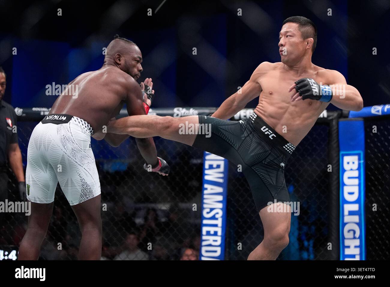 Kyoji Horiguchi kicks Manel Kape during their flyweight bout at a UFC ...