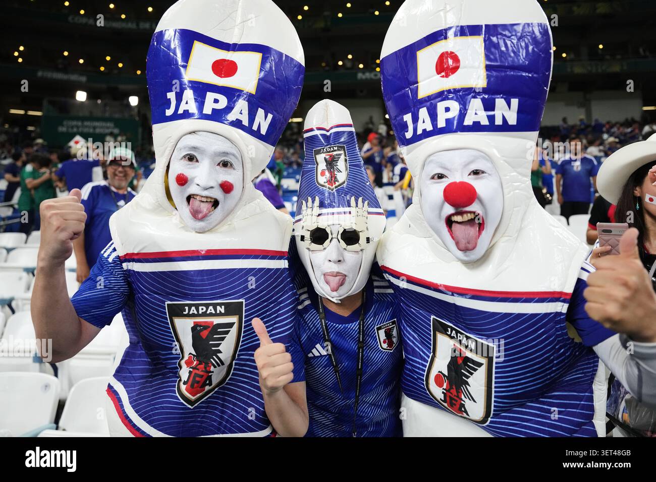 Fans of Japan pose for a picture prior to the World Cup Group F soccer ...