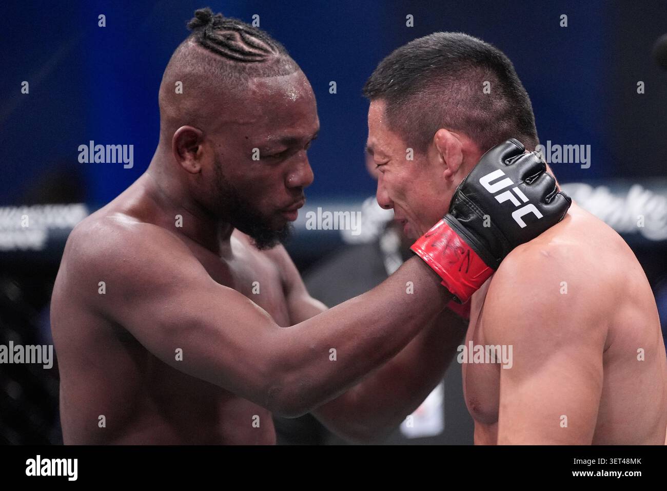 Manel Kape, left, embraces Kyoji Horiguchi after their flyweight bout ...