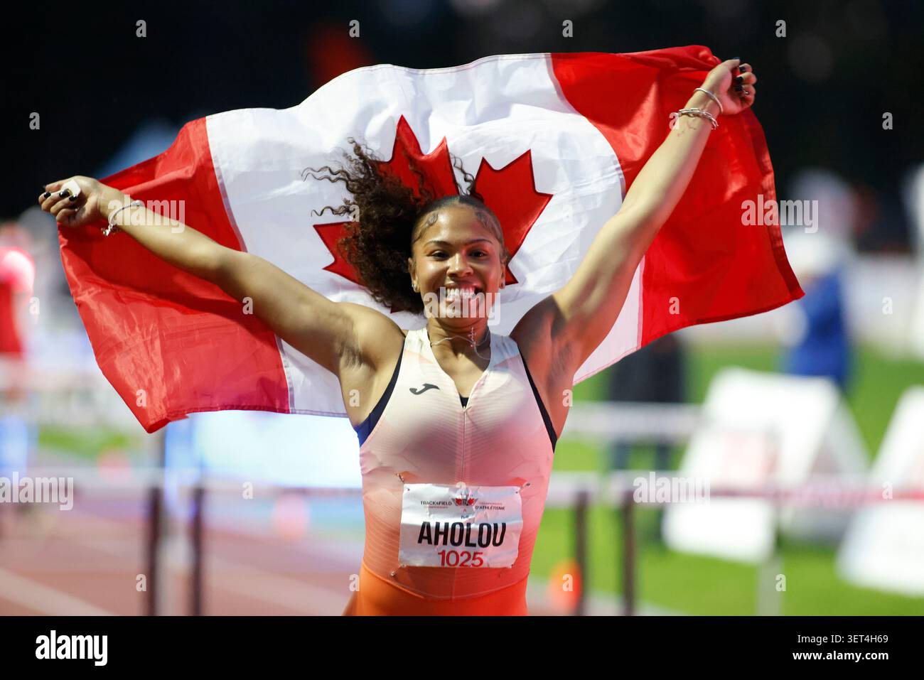 Tatiana Aholou celebrates after winning the senior women's 100m hurdles ...