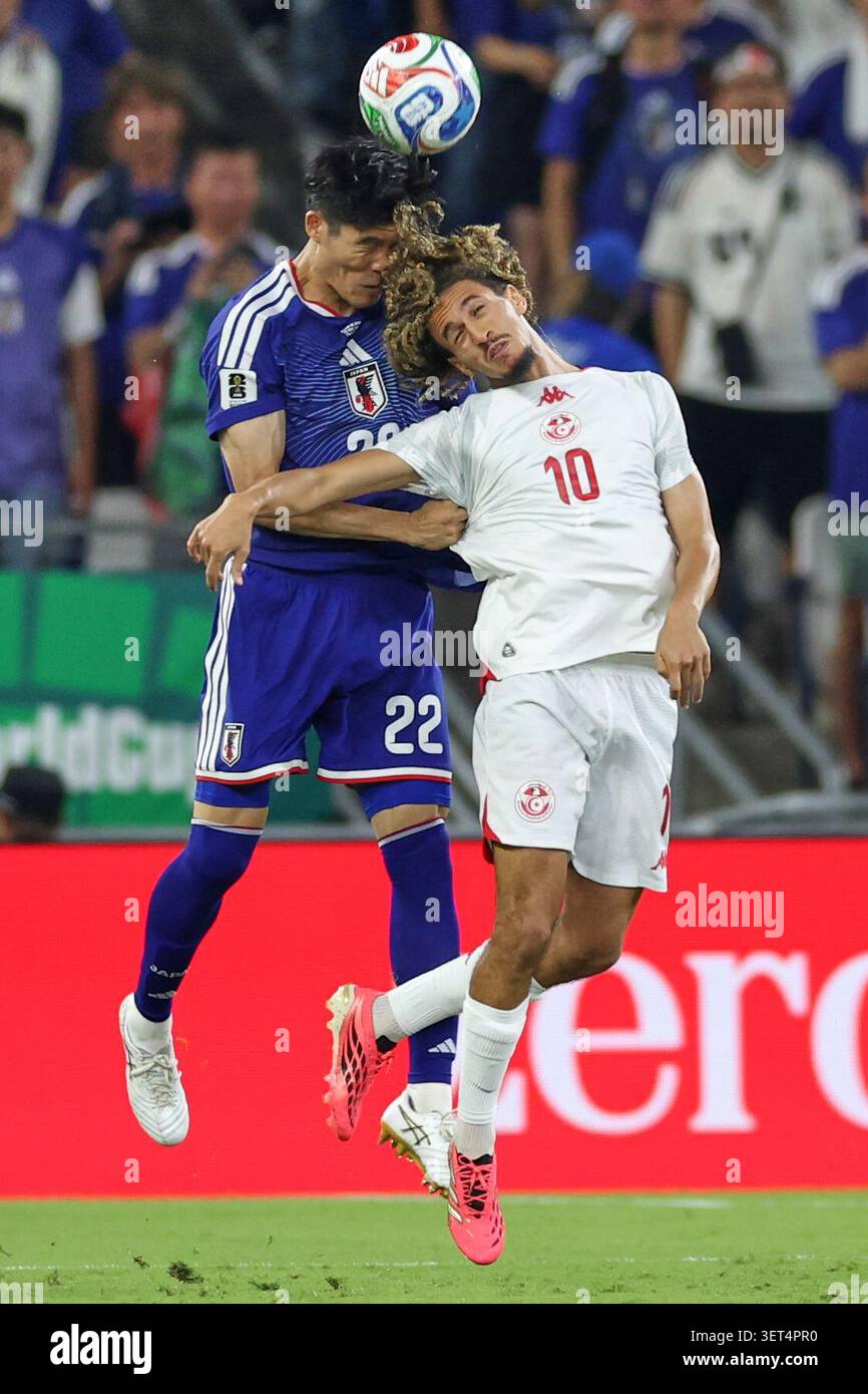 Japan's Takehiro Tomiyasu (22) and Tunisia's Hannibal Mejbri (10 ...