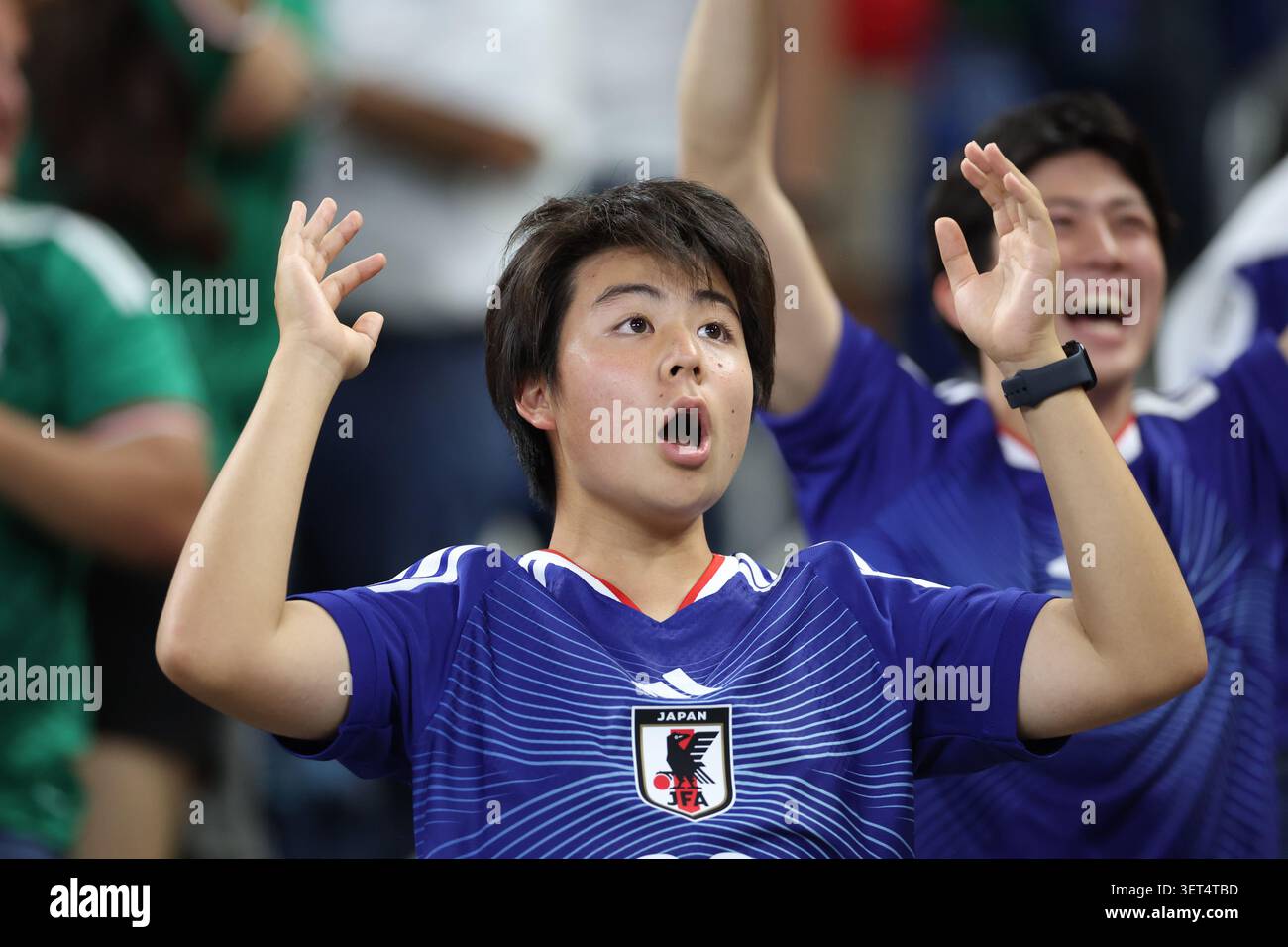 A Japanese fan reacts after Japan's Ayase Ueda (18) scored their second ...