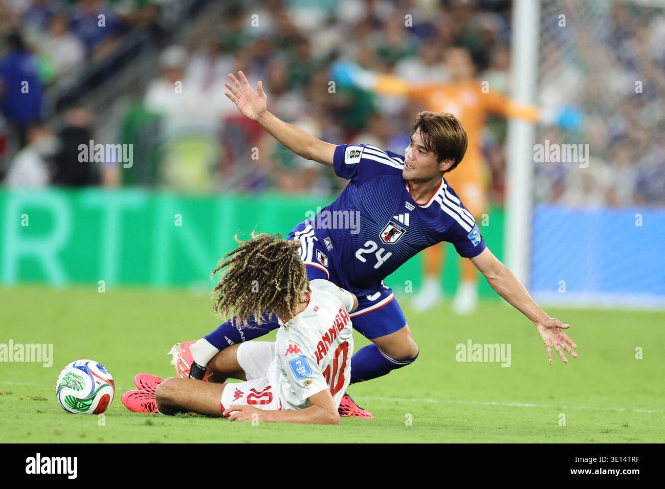 Japan's Kaishu Sano (24) reacts after a challenge by Tunisia's Hannibal ...