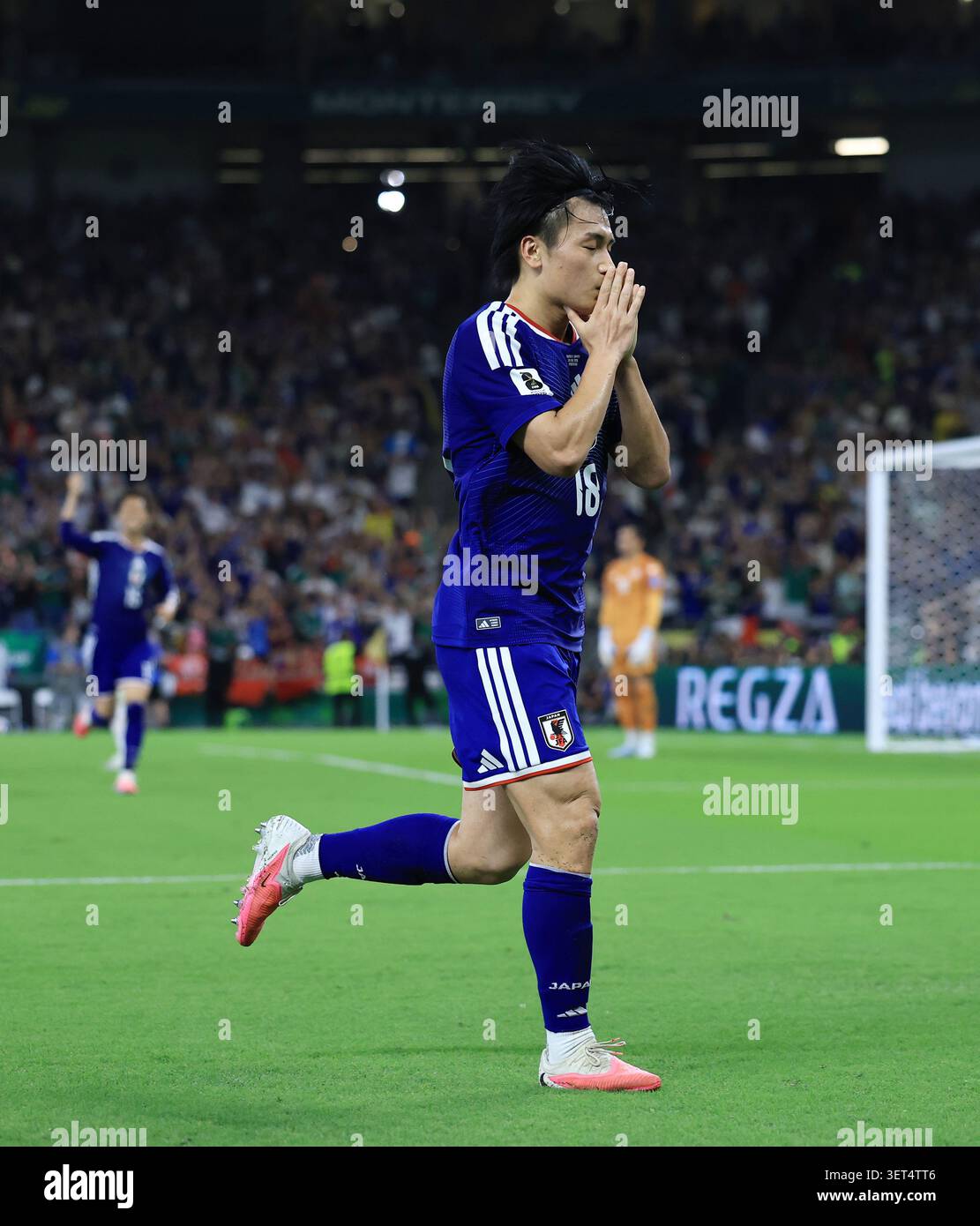 Ayase Ueda (18) of Japan reacts after scoring in the first half of 2026 ...