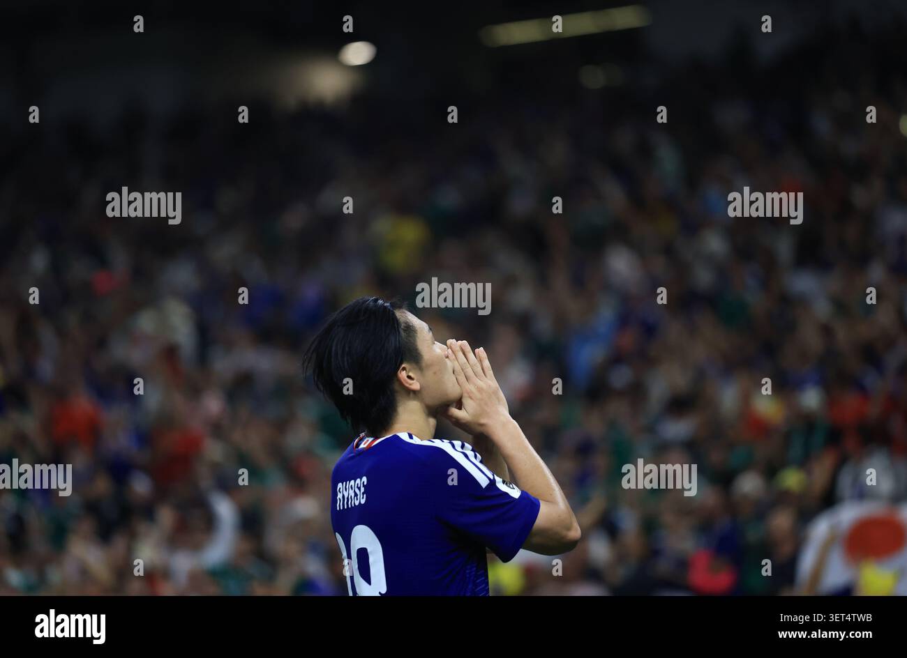 Ayase Ueda (18) of Japan reacts after scoring in the first half of 2026 ...