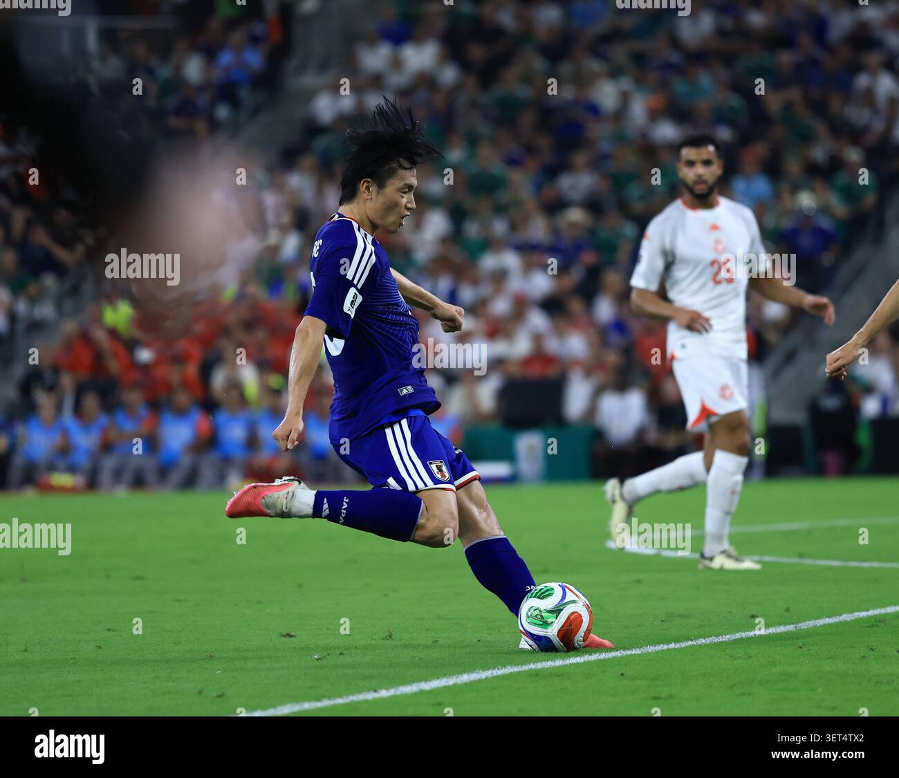 Ayase Ueda (18) of Japan scores in the first half of 2026 FIFA World ...