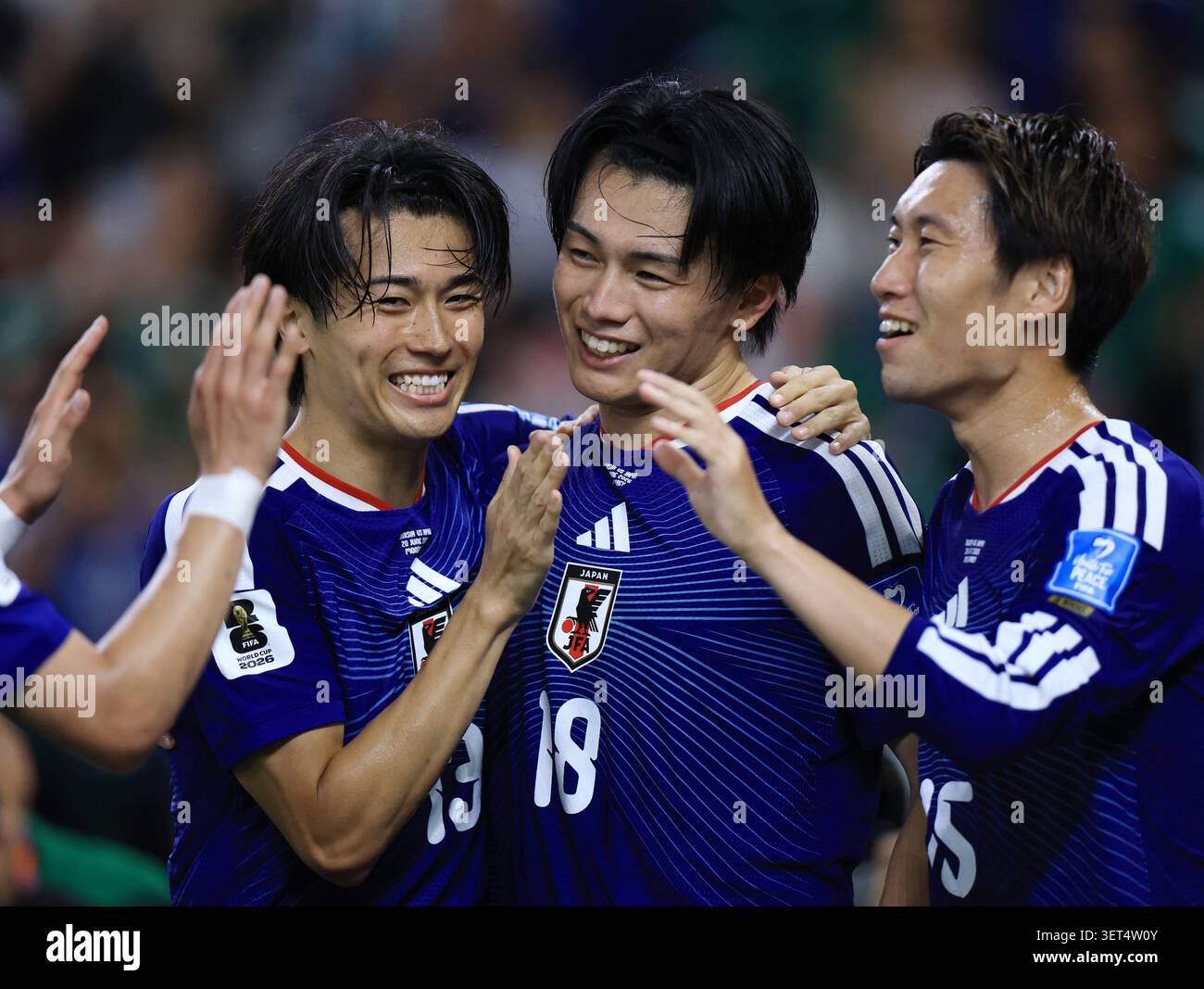 Ayase Ueda (18) of Japan reacts after scoring in the first half of 2026 ...