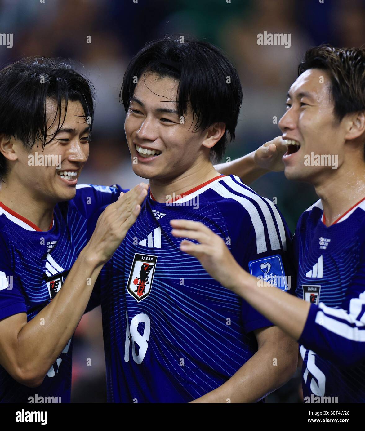 Ayase Ueda (18) of Japan reacts after scoring in the first half of 2026 ...