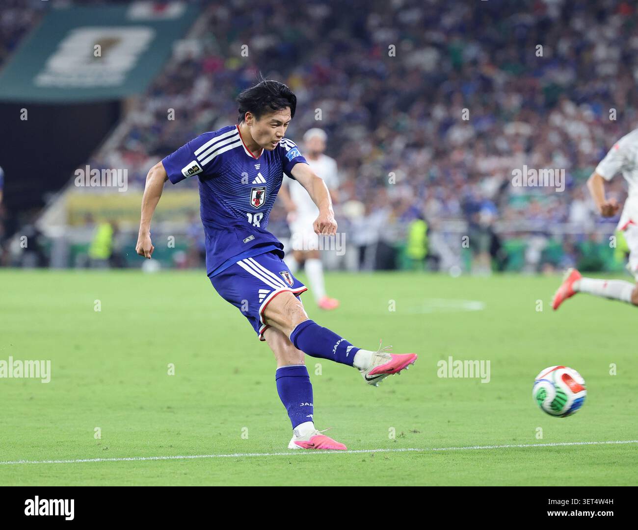 Ayase Ueda (18) of Japan scores in the first half of 2026 FIFA World ...