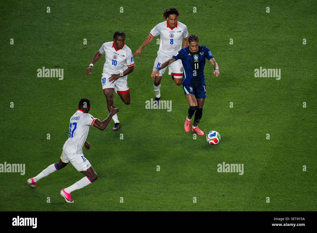 Raphinha of Brazil is challenged by Danley Jean Jacques, Jean-Ricner ...