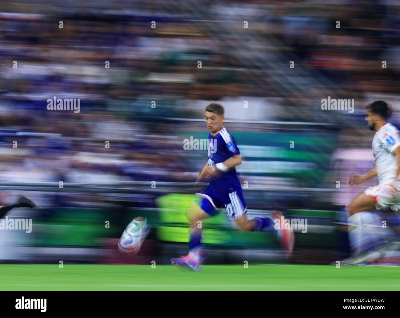 Ritsu Doan of Japan holds a ball in the second half of 2026 FIFA World ...
