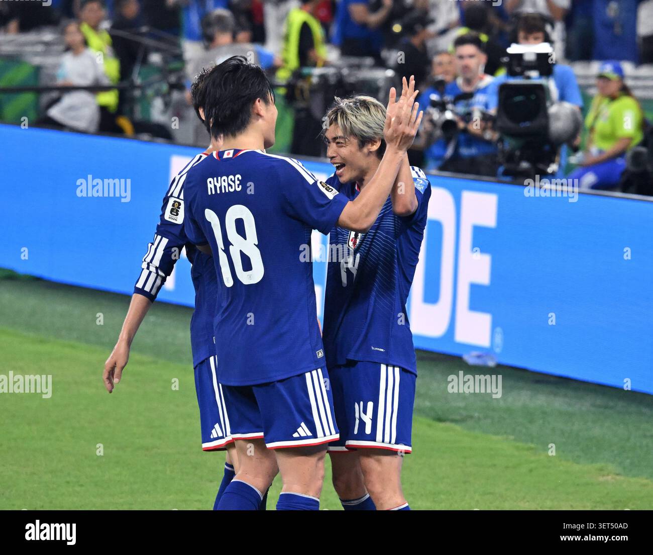 Junya Ito (14) of Japan reacts after scoring in the second half of 2026 ...