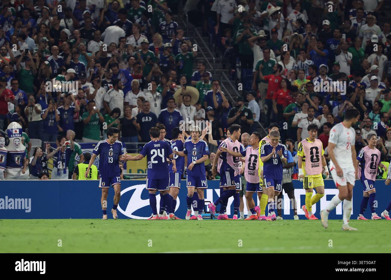 Junya Ito (14) of Japan scores in the second half of 2026 FIFA World ...