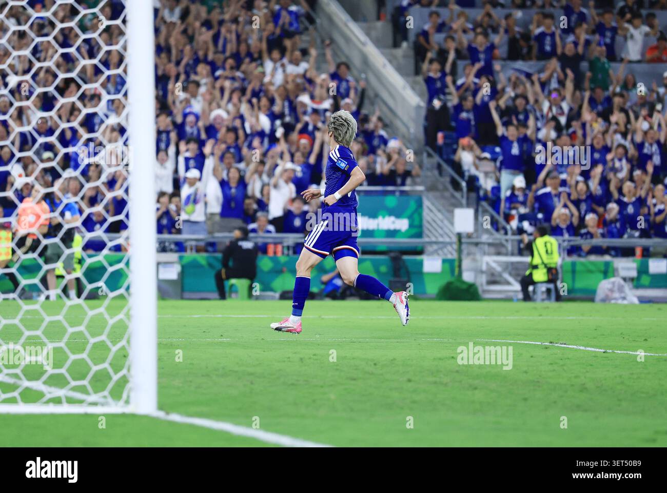 Junya Ito (14) of Japan reacts after scoring in the second half of 2026 ...