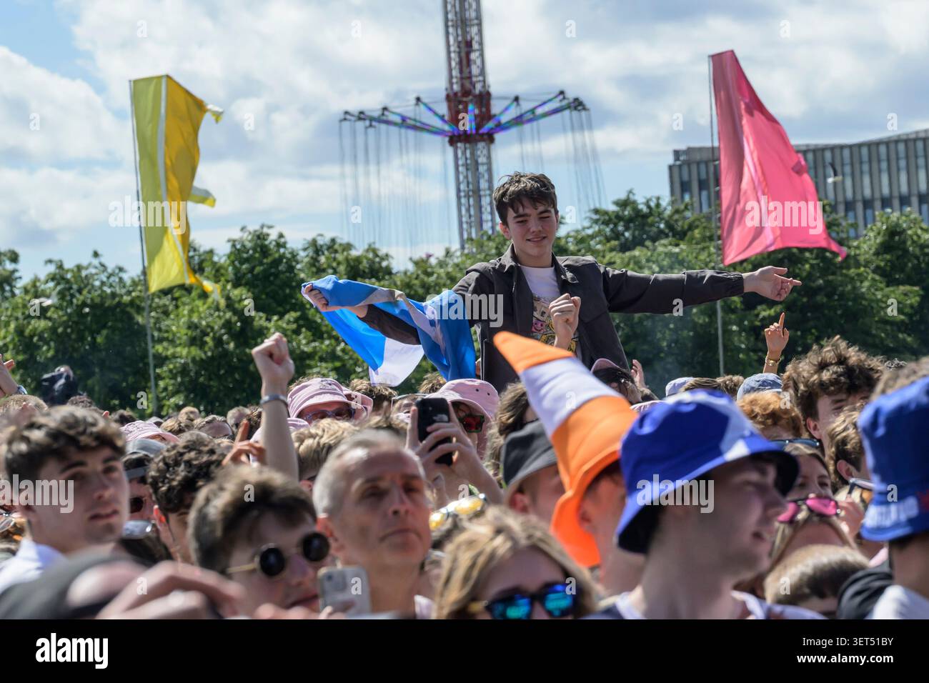 Glasgow, UK. 20th June, 2026. Festival goers enjoying the sun and music ...