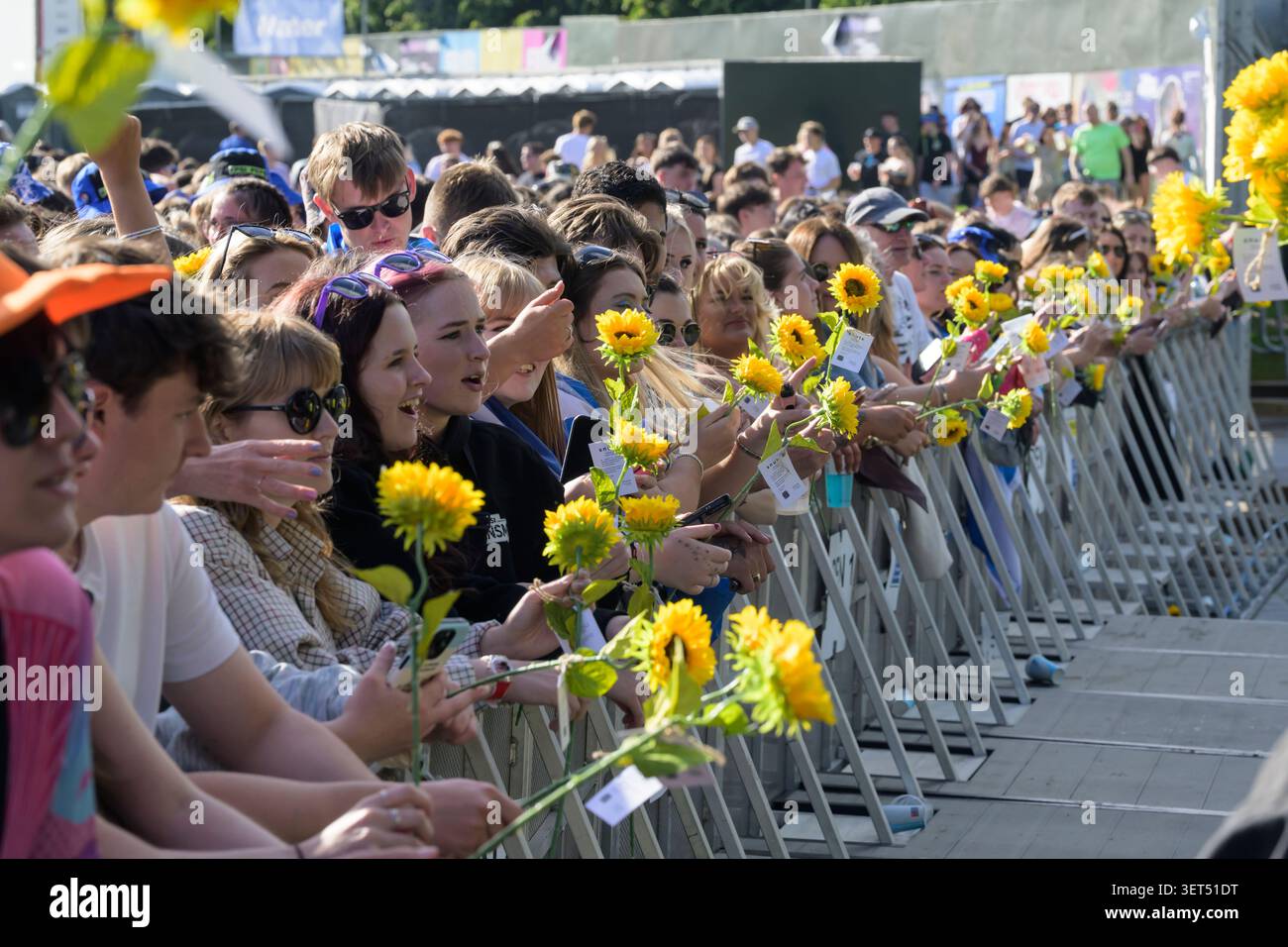 Glasgow, UK. 20th June, 2026. Festival goers enjoying the sun and music ...