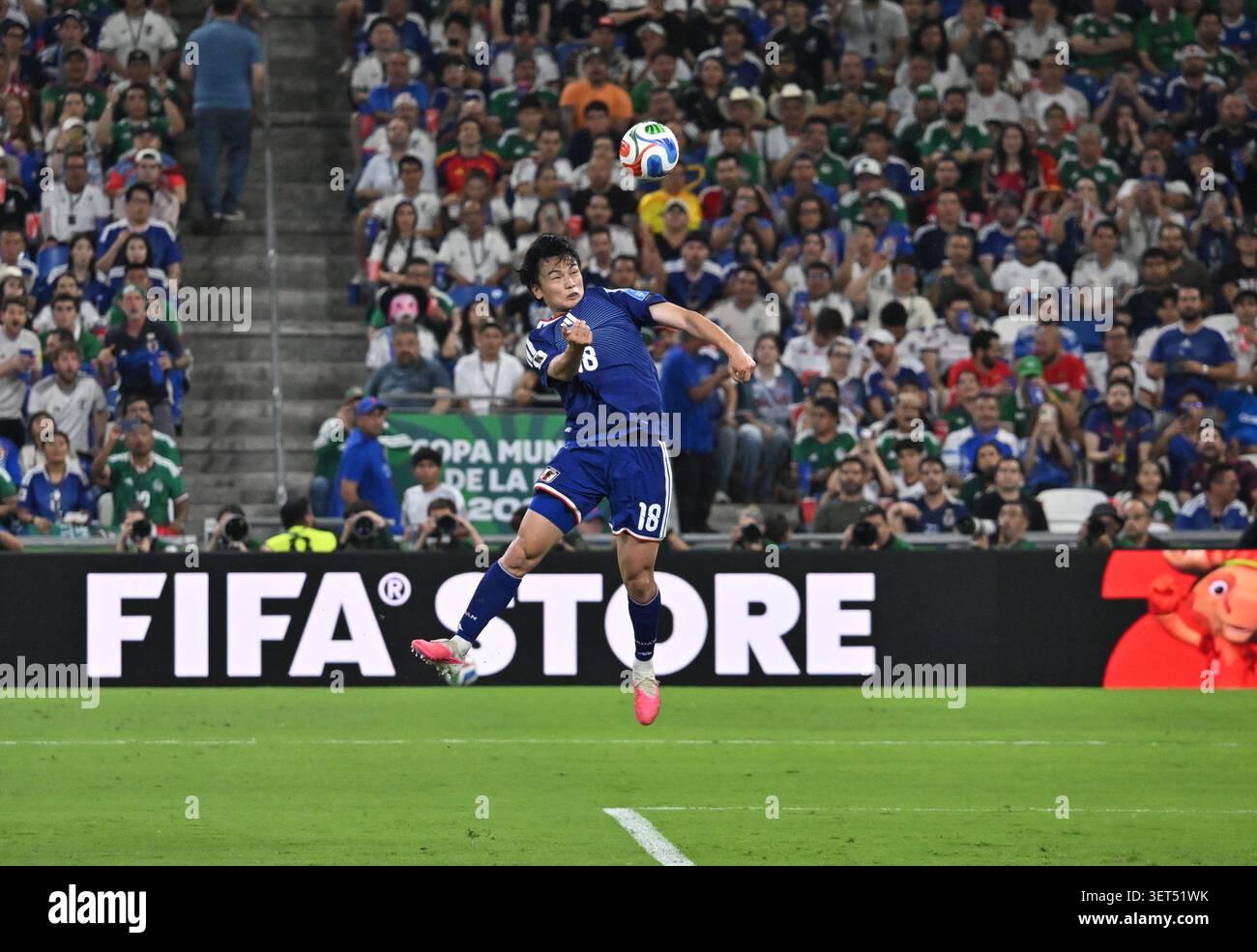 Ayase Ueda (18) of Japan scores by header in the second half of 2026 ...