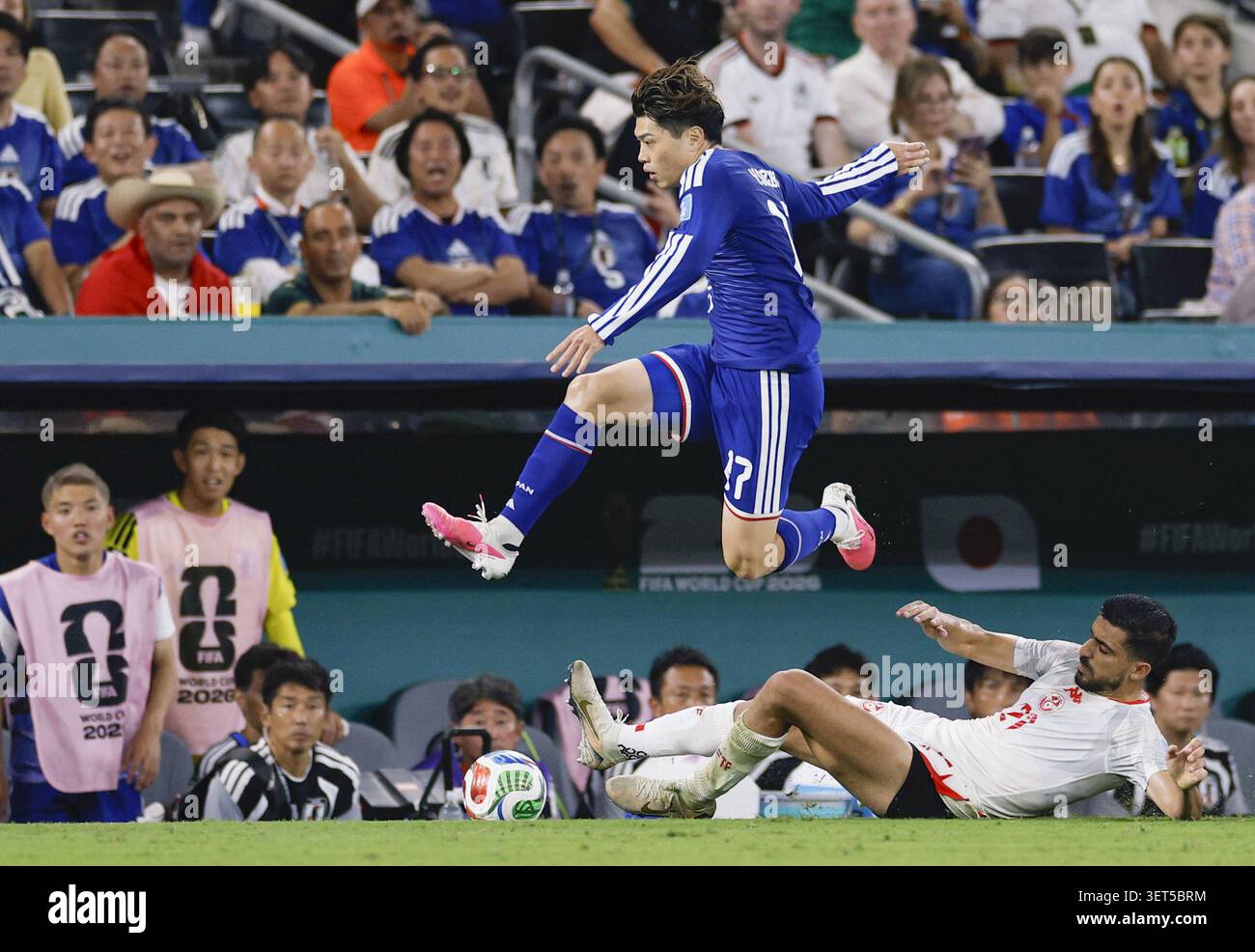 Japan's Yuito Suzuki (top) plays in the second half of a World Cup ...
