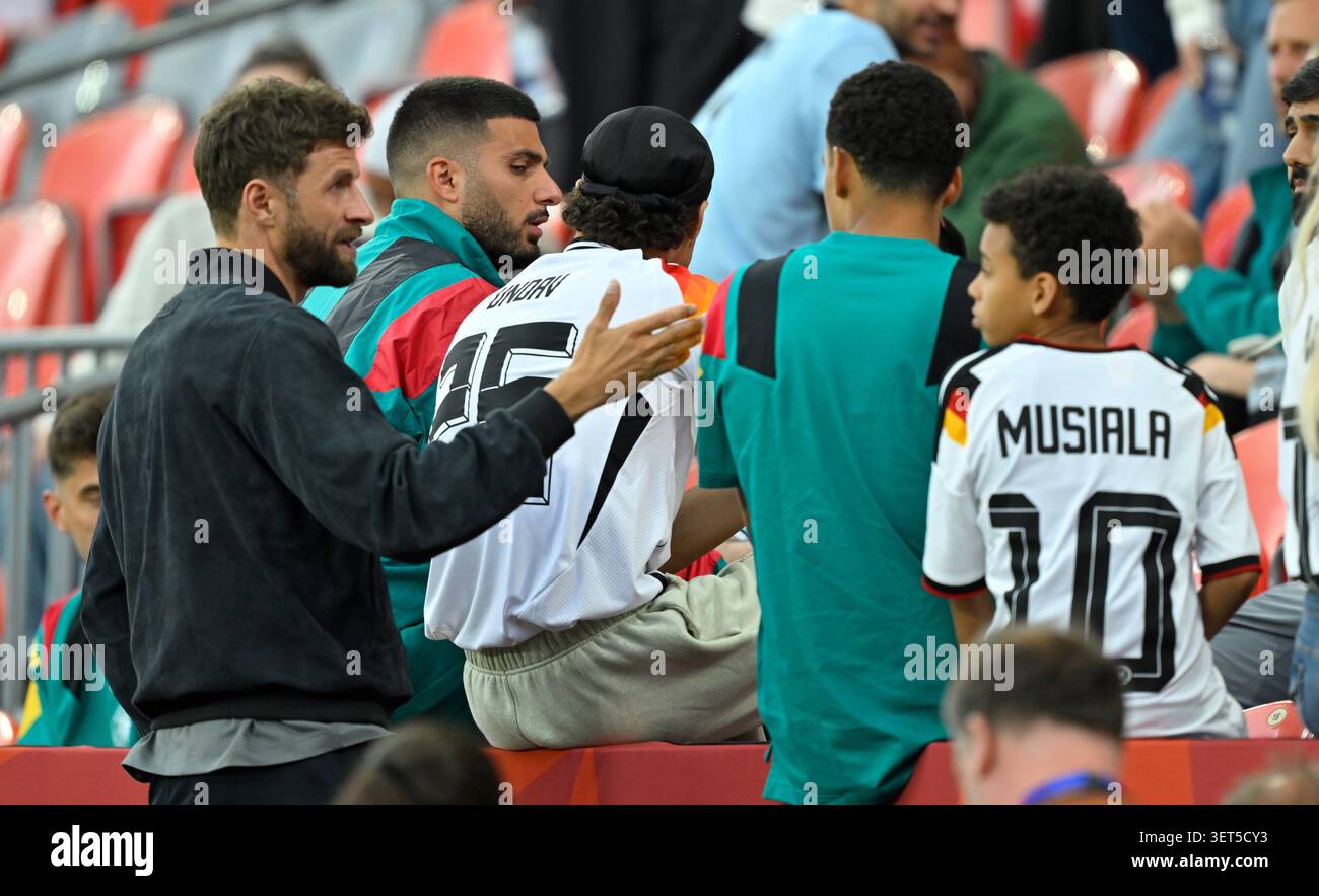 from left: TV expert Thomas Mueller, Deniz Undav (Germany), Jamal ...