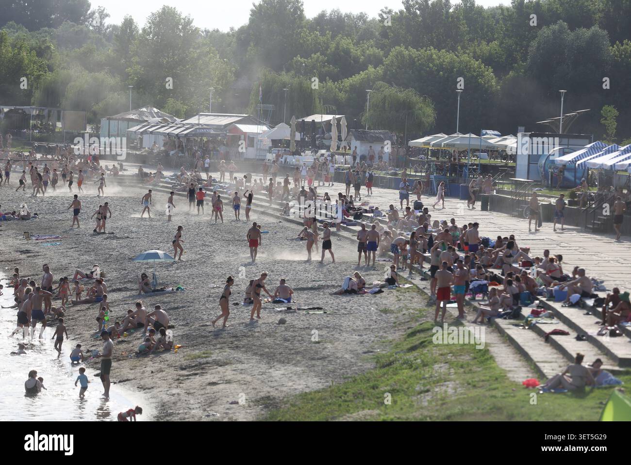 People enjoying the beach at Kopika beach at the start of summer season ...