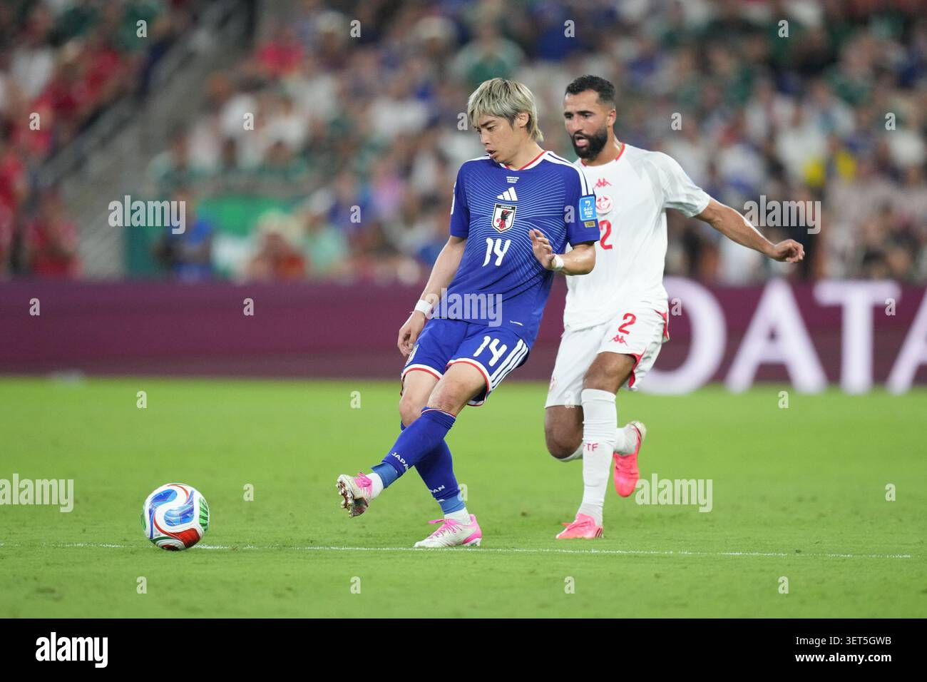 Ali ABDI of Tunisia and Junya Ito of Japan during the FIFA World Cup ...