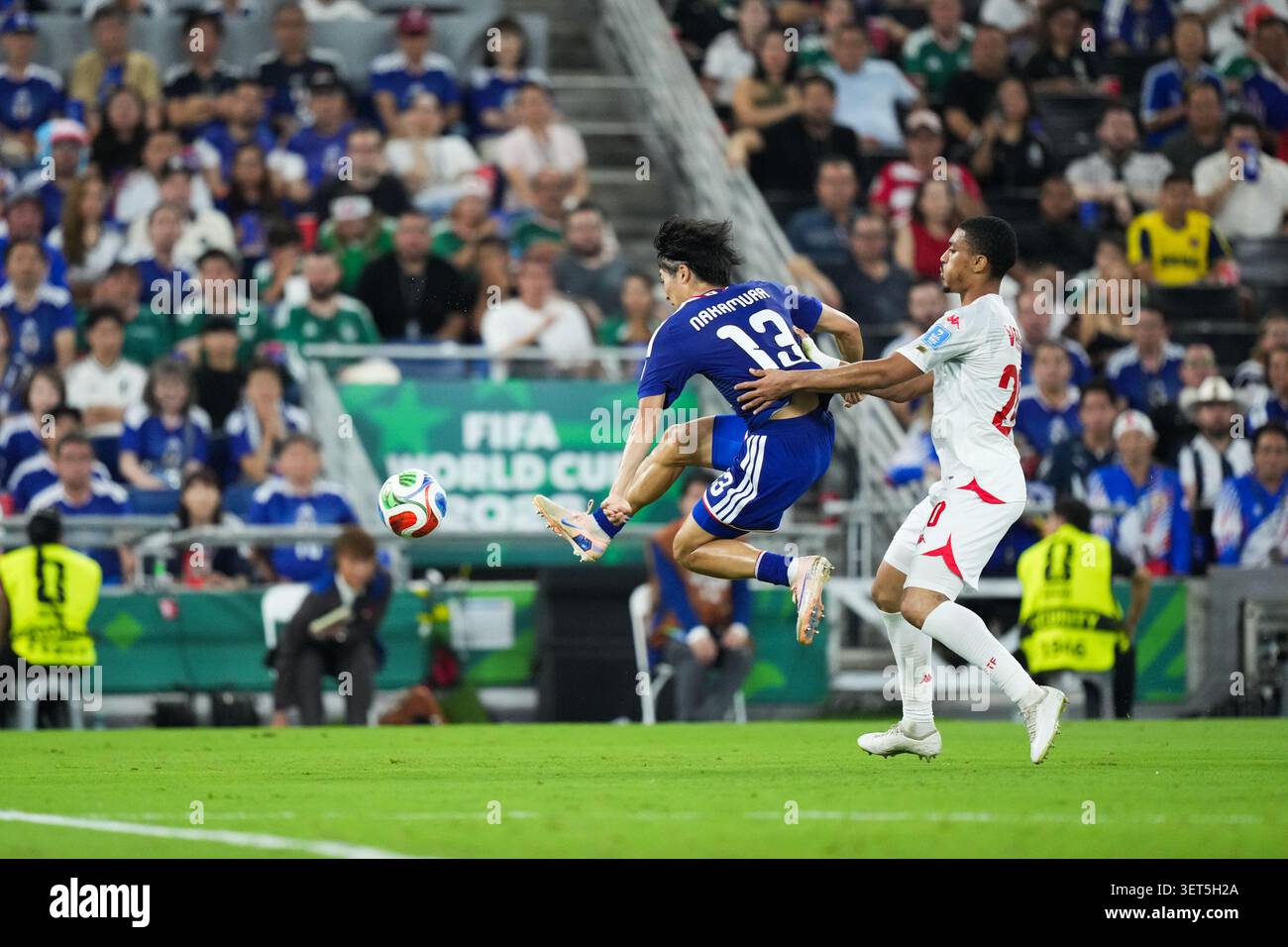 Keito NAKAMURA of Japan and Yan Valery of Tunisia during the FIFA World ...
