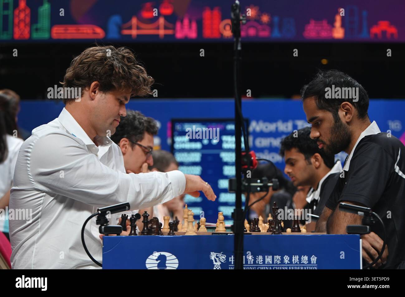Magnus Carlsen, a Norwegian player battles Arjun Erigaisi, an Indian ...