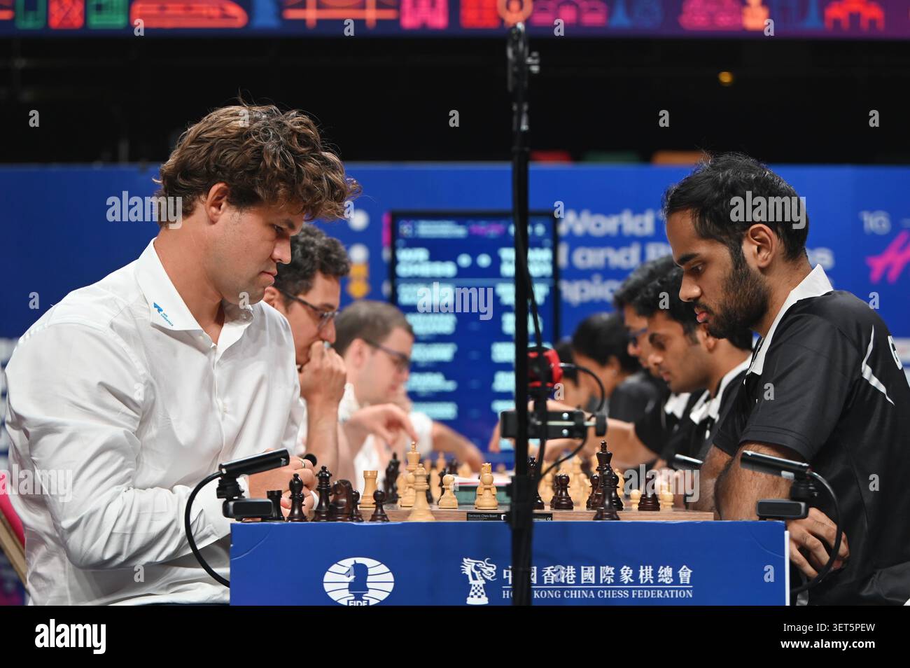 Magnus Carlsen, a Norwegian player battles Arjun Erigaisi, an Indian ...