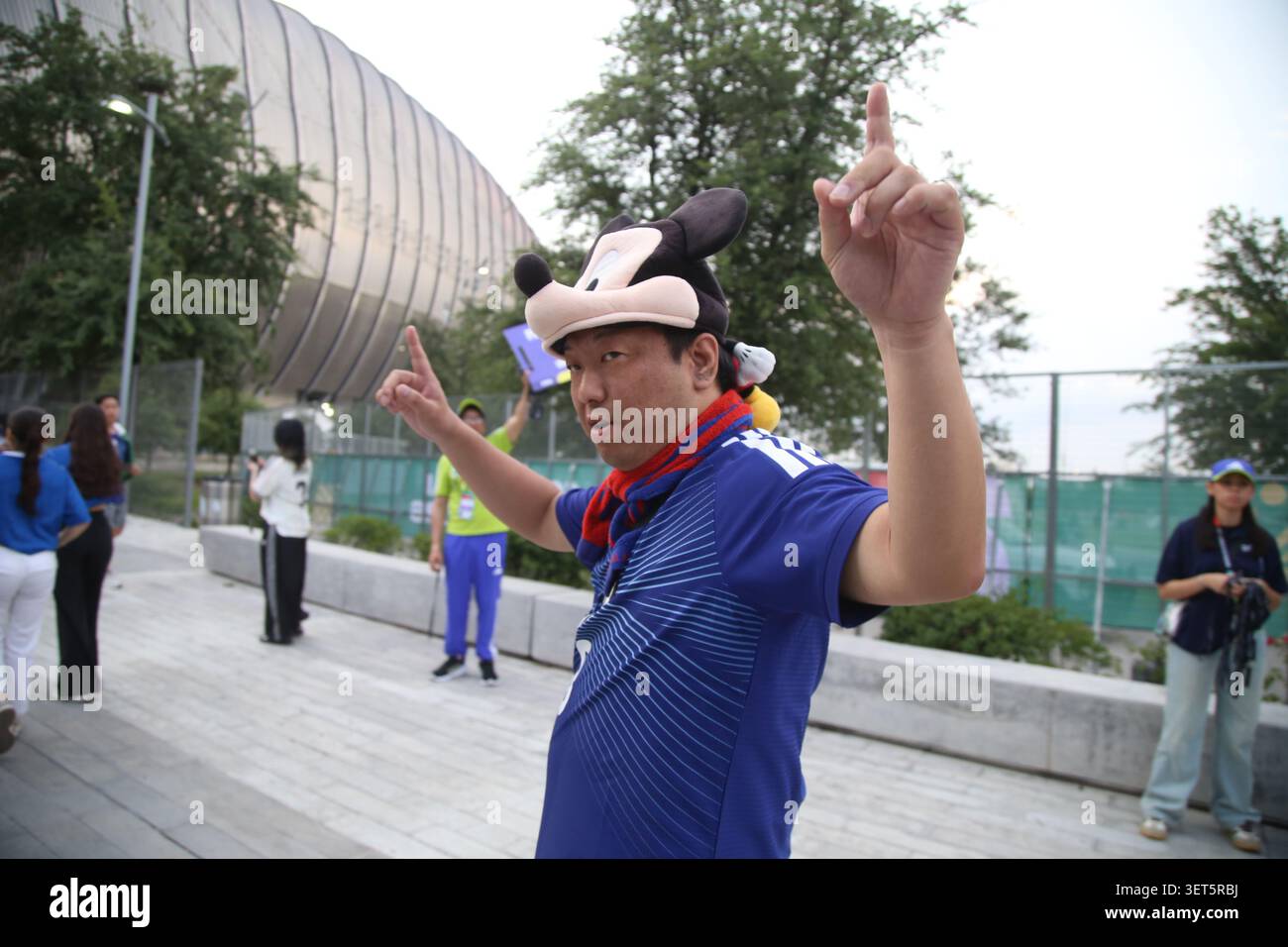 A fan of Japan national team attending the Monterrey Stadium to support ...