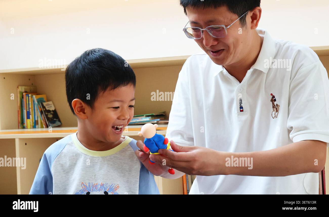 Children make 'Superman Dad' intangible cultural heritage dough ...