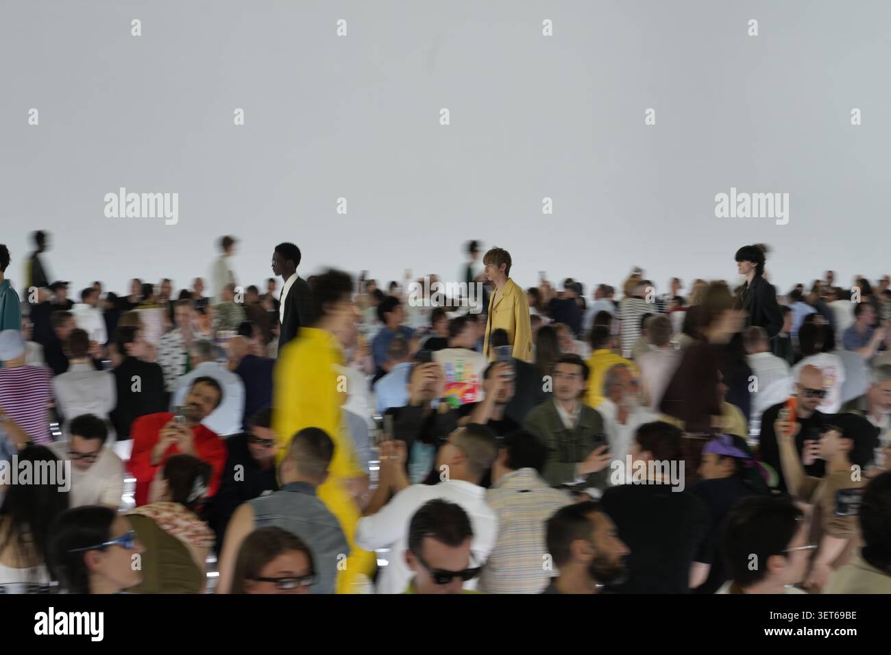 Models wear creations from Prada's Spring/Summer 2027 men's collection ...
