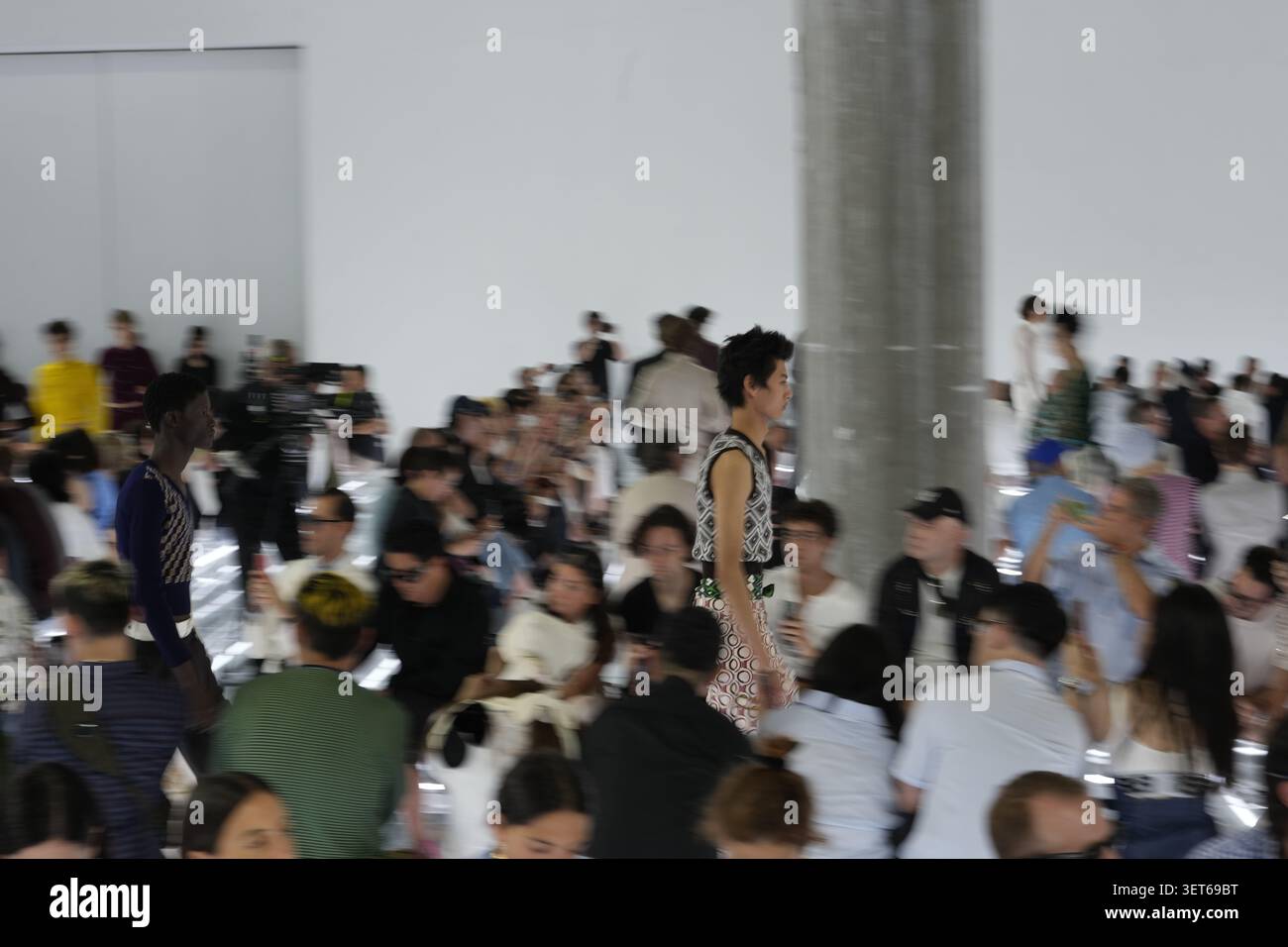 Models wear creations from Prada's Spring/Summer 2027 men's collection ...