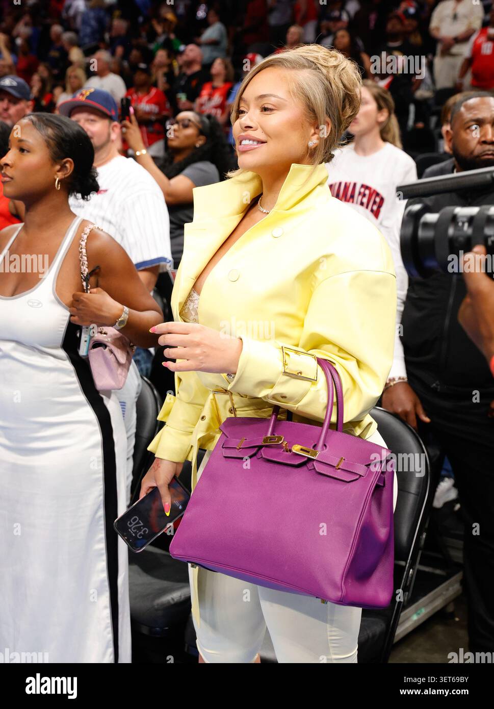 Latto attends the Indiana Fever and Atlanta Dream basketball game at ...