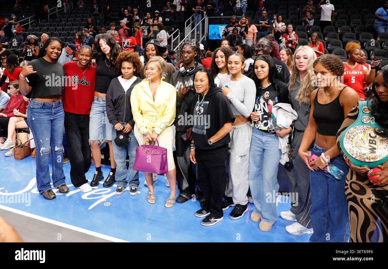 Dawn Staleyand Latto take a group picture at the Indiana Fever and ...