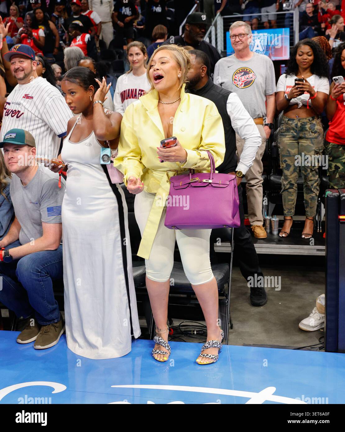 Latto attends the Indiana Fever and Atlanta Dream basketball game at ...