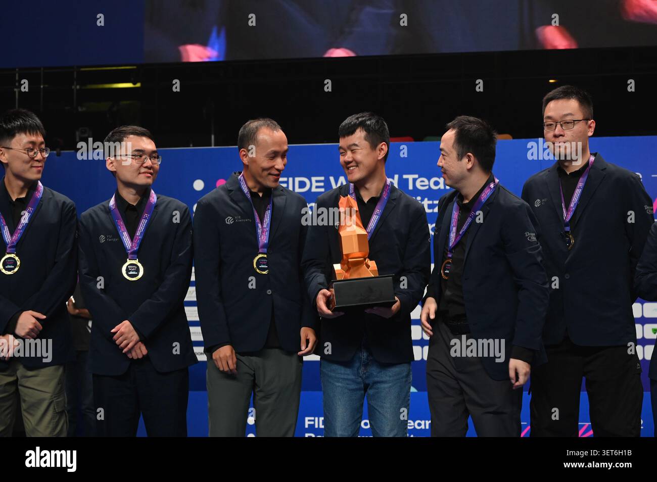 Ding Liren andTeam Dragon Chilling getting Rapid champion and posing ...