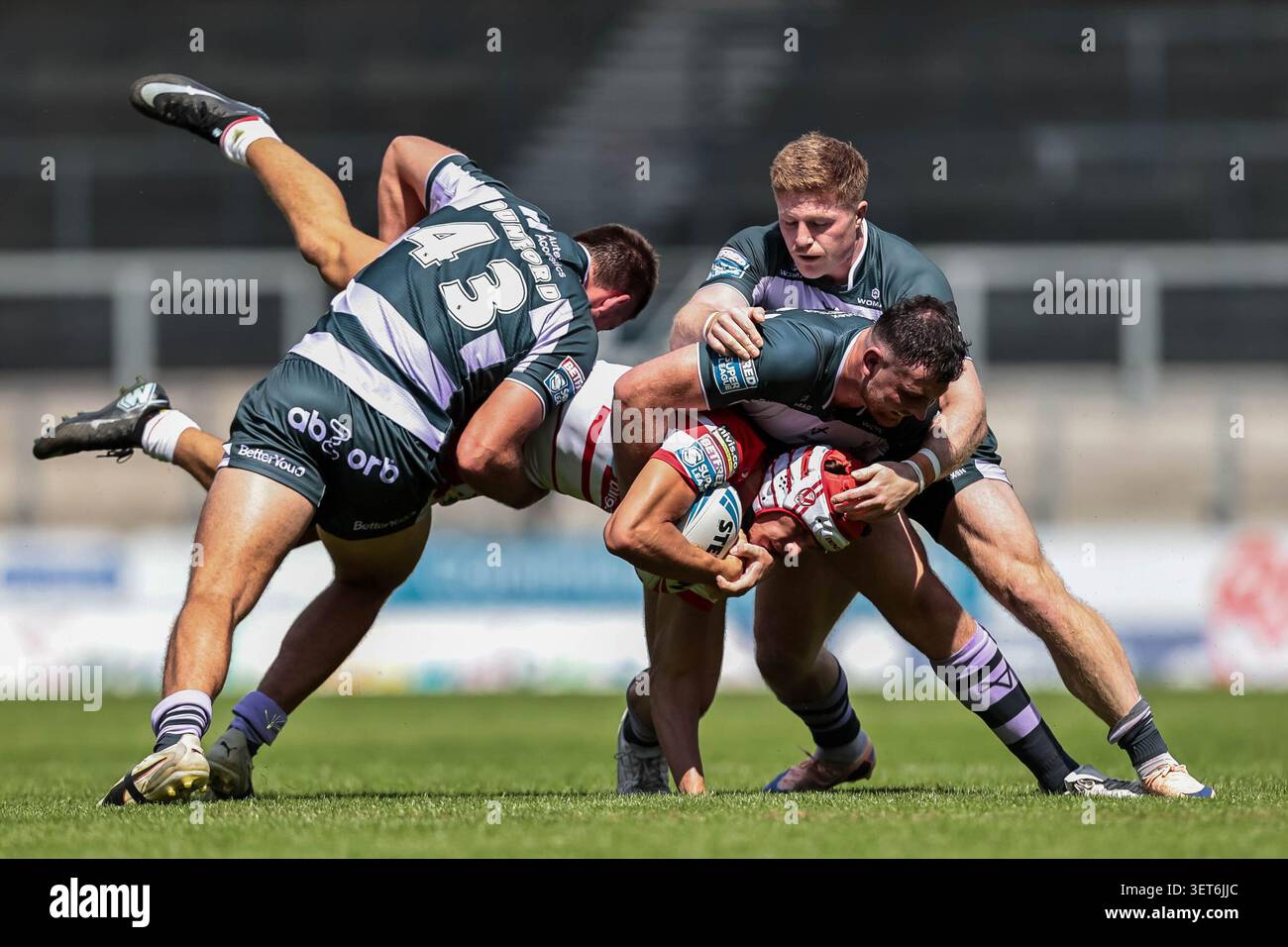 Zane Dunford Zac Woolford and Fenton Rogers tackle Harry Robertson ...