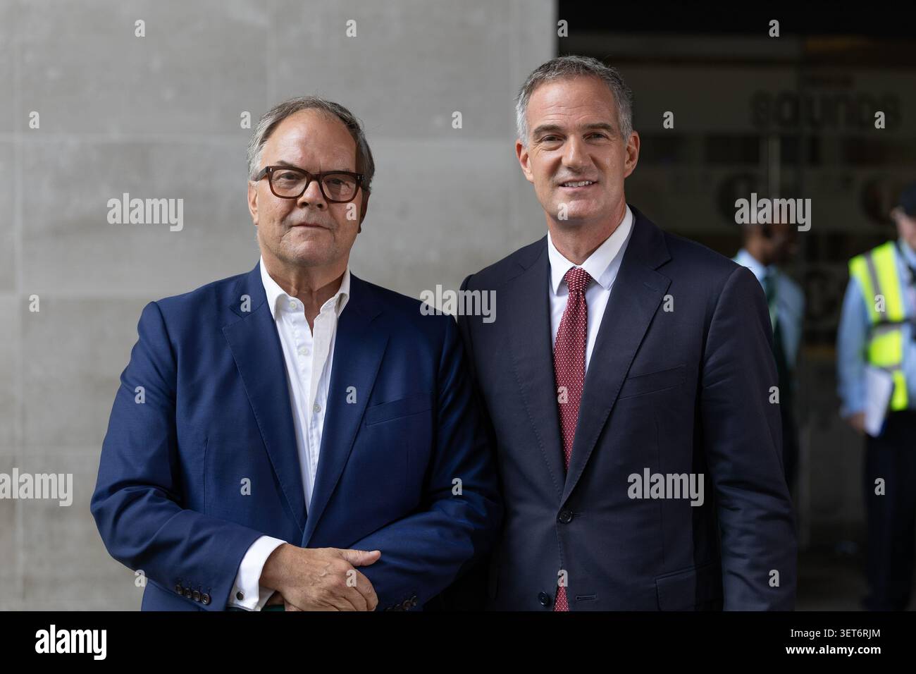 (L-R) Matt Frei poses with Business Secretary Peter Kyle after his ...