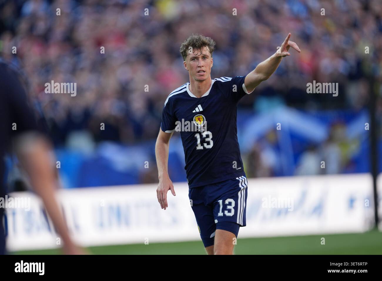 Scotland's Jack Hendry (13) points during the World Cup Group C soccer ...