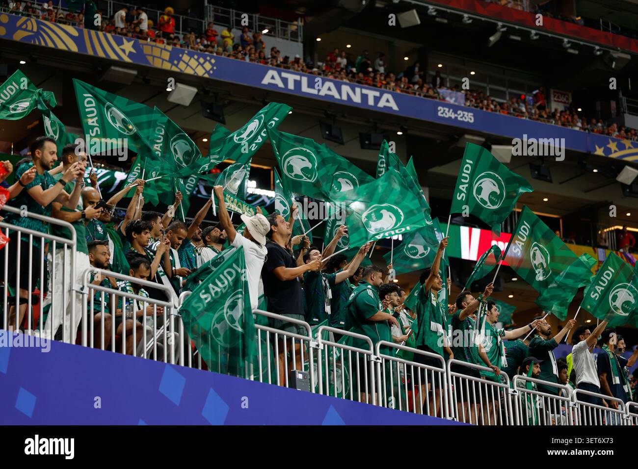 Saudi Arabia fans wave flags in the stands prior to the World Cup Group ...
