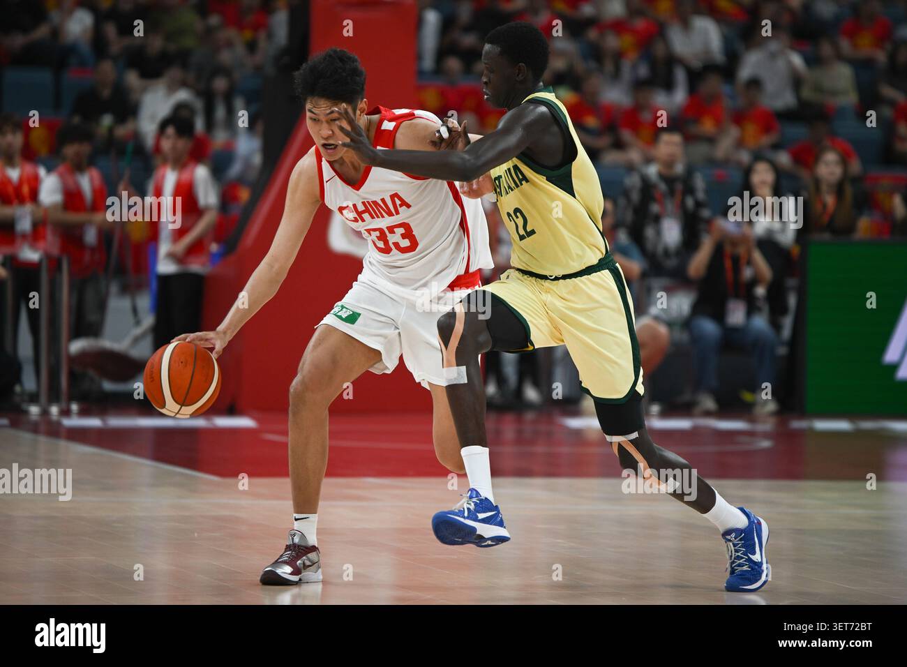 Hangzhou, China. 21 June, 2026. Wang Haoran #33 of China and Kuai Alier ...