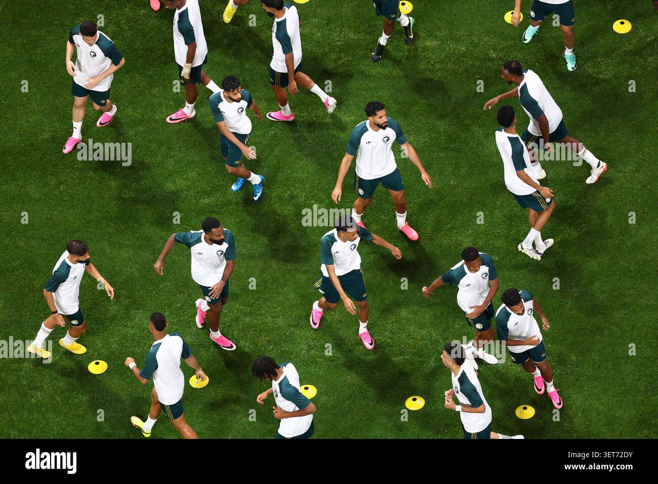 Saudi Arabia players warm up before the World Cup Group H soccer match ...