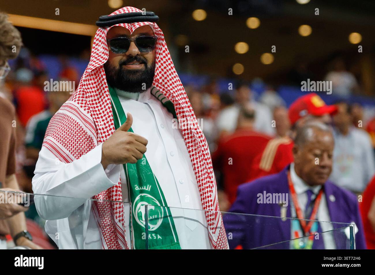 A Saudi Arabia supporter gives the thumb-up sign prior to the World Cup ...
