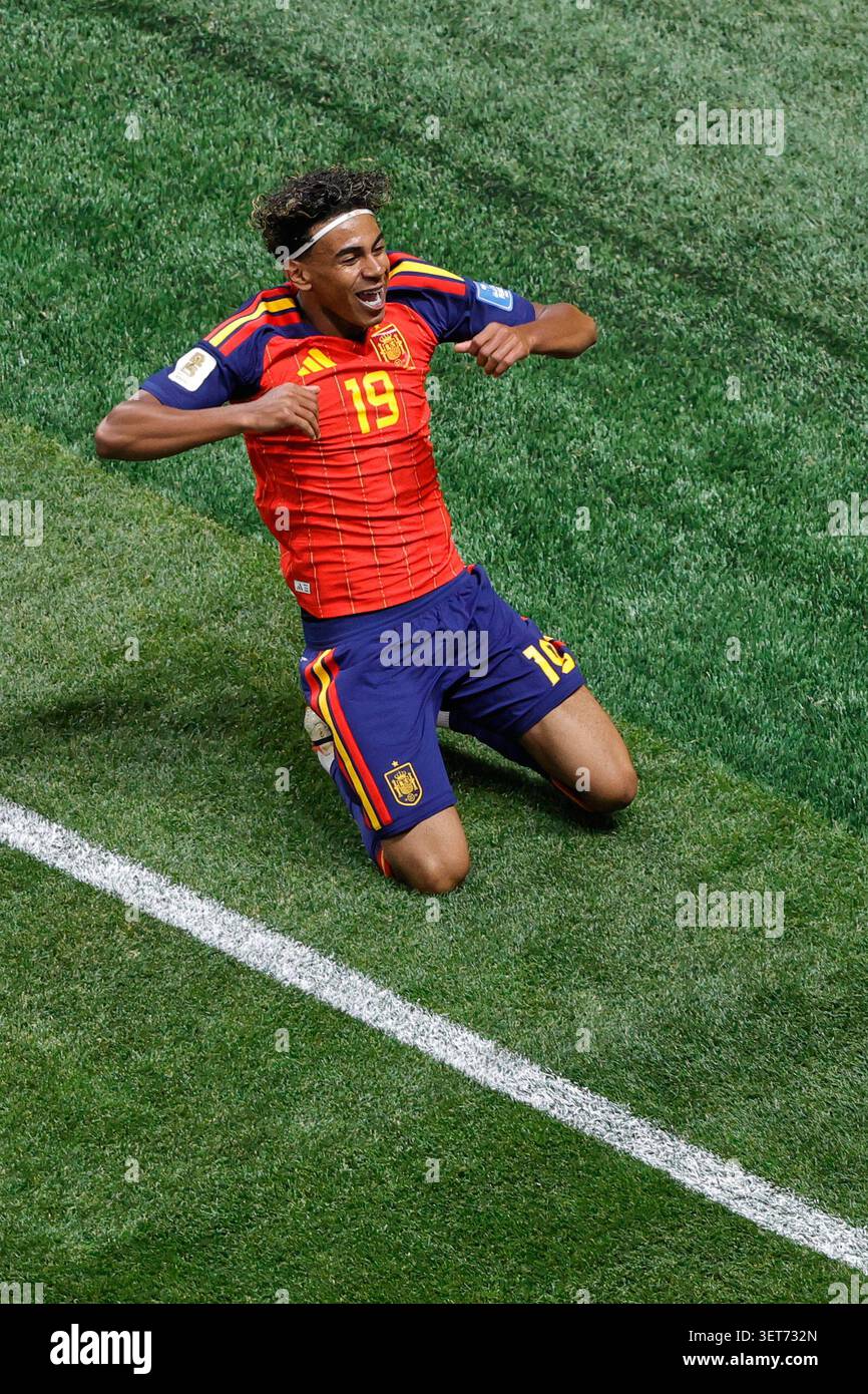 Spain's Lamine Yamal celebrates after scoring the opening goal against ...