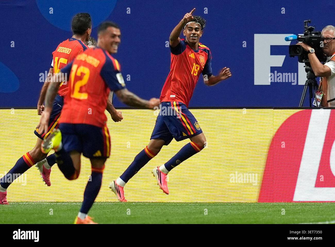Spain's Lamine Yamal celebrates after scoring the opening goal during ...